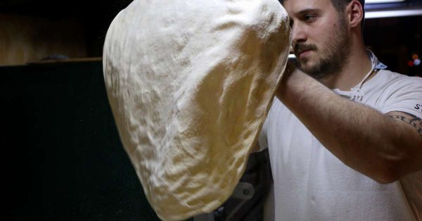 How To Stretch Pizza Dough By Hand: Easiest Method For Beginners - My ...