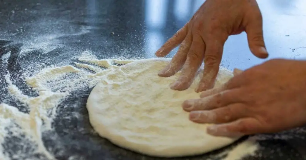 How To Stretch Pizza Dough By Hand: Easiest Method For Beginners - My ...